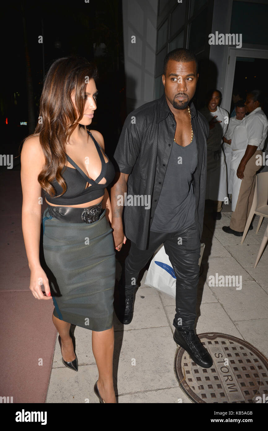 MIAMI BEACH, FL - OCTOBER 14: Kim Kardashian and boyfriend Kanye West ...