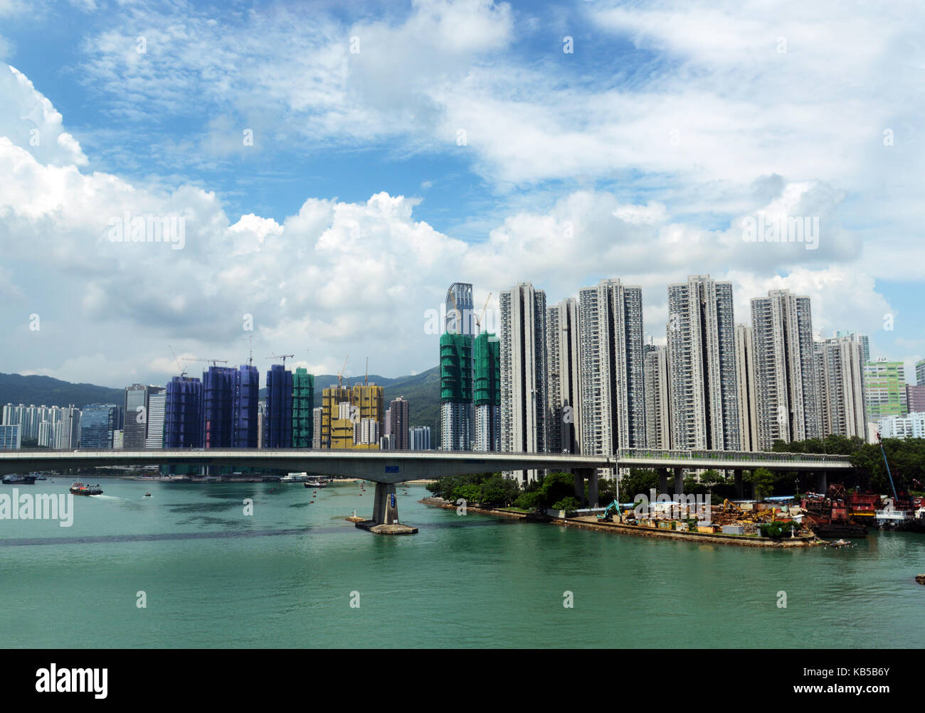 The South Island MTR train crossing the Ap Lei Chau bridge in Hong Kong ...
