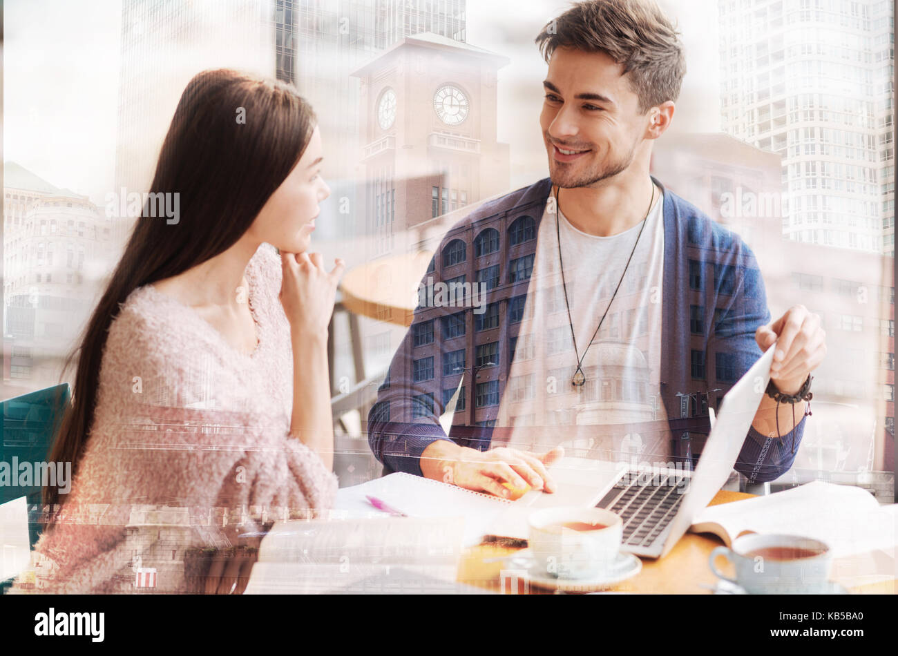 Smiling man looking at beautiful girl Stock Photo - Alamy