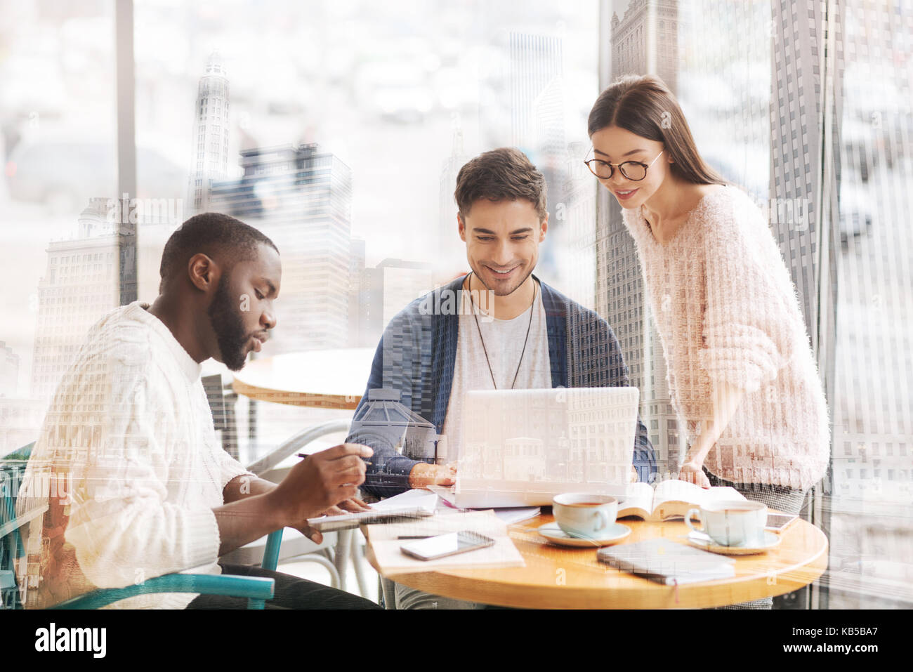 Optimistic students having fun together Stock Photo - Alamy