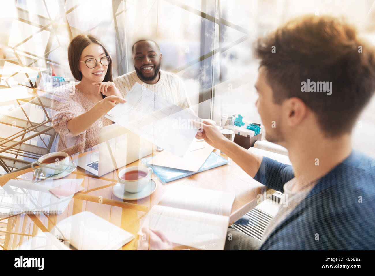 Happy students discussing test results Stock Photo - Alamy