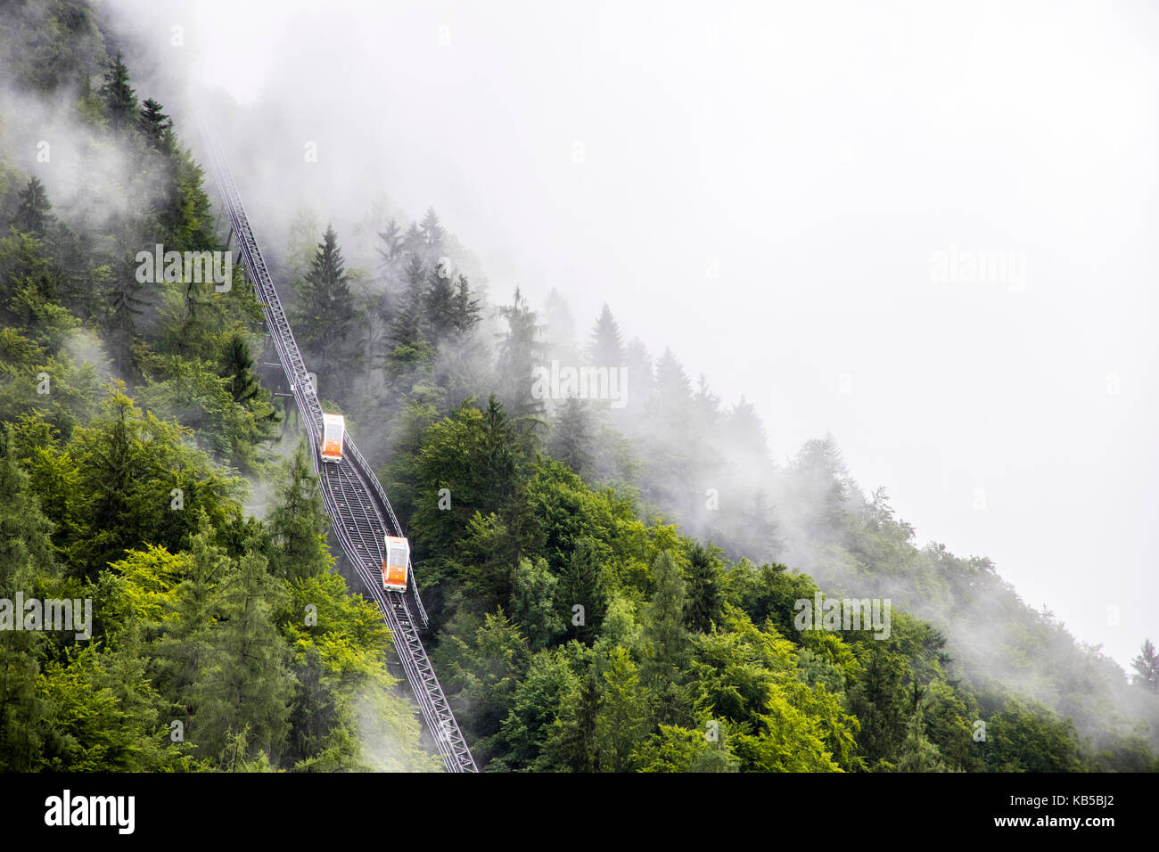 Two wagons crossing on a two-rail funicular in the mountains of ...