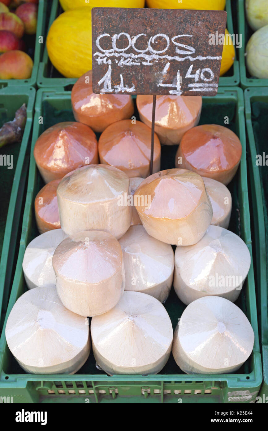 Natural Coconut Water Drink in Dehusked Shell Stock Photo - Alamy