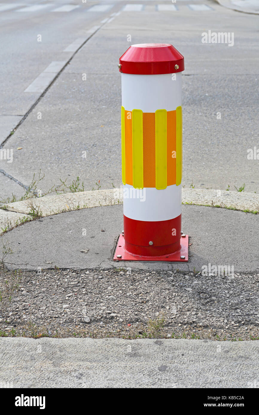 Traffic Pillar Reflective Sing at Street Island Stock Photo - Alamy