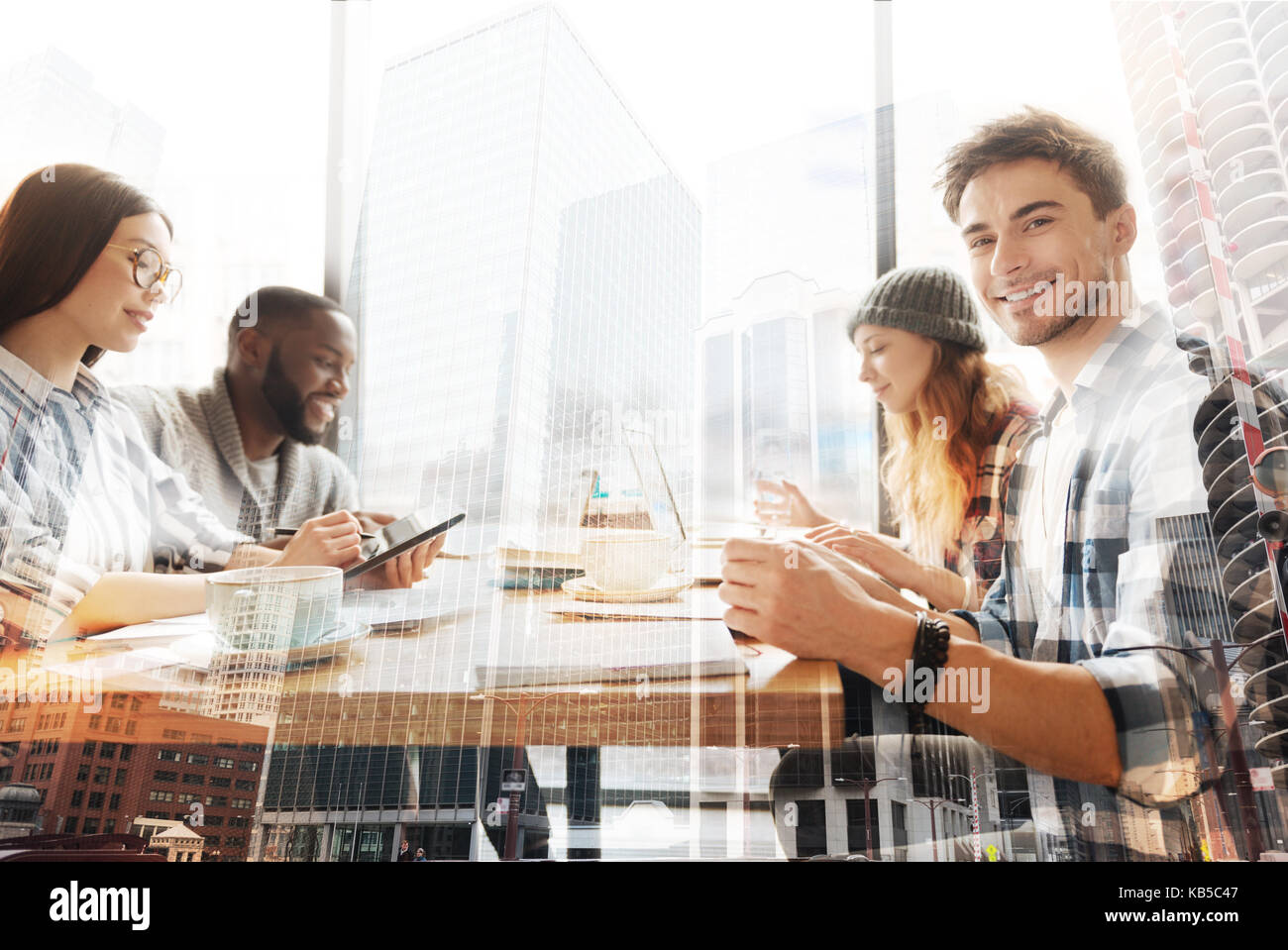 Happy students having rest after classes Stock Photo - Alamy