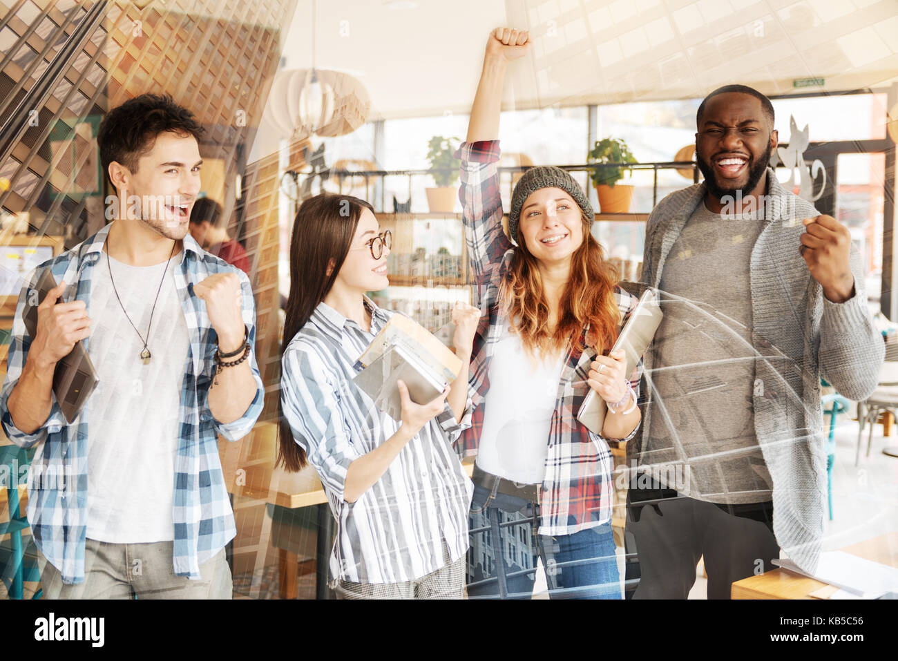 Optimistic students celebrating the end of the day Stock Photo - Alamy