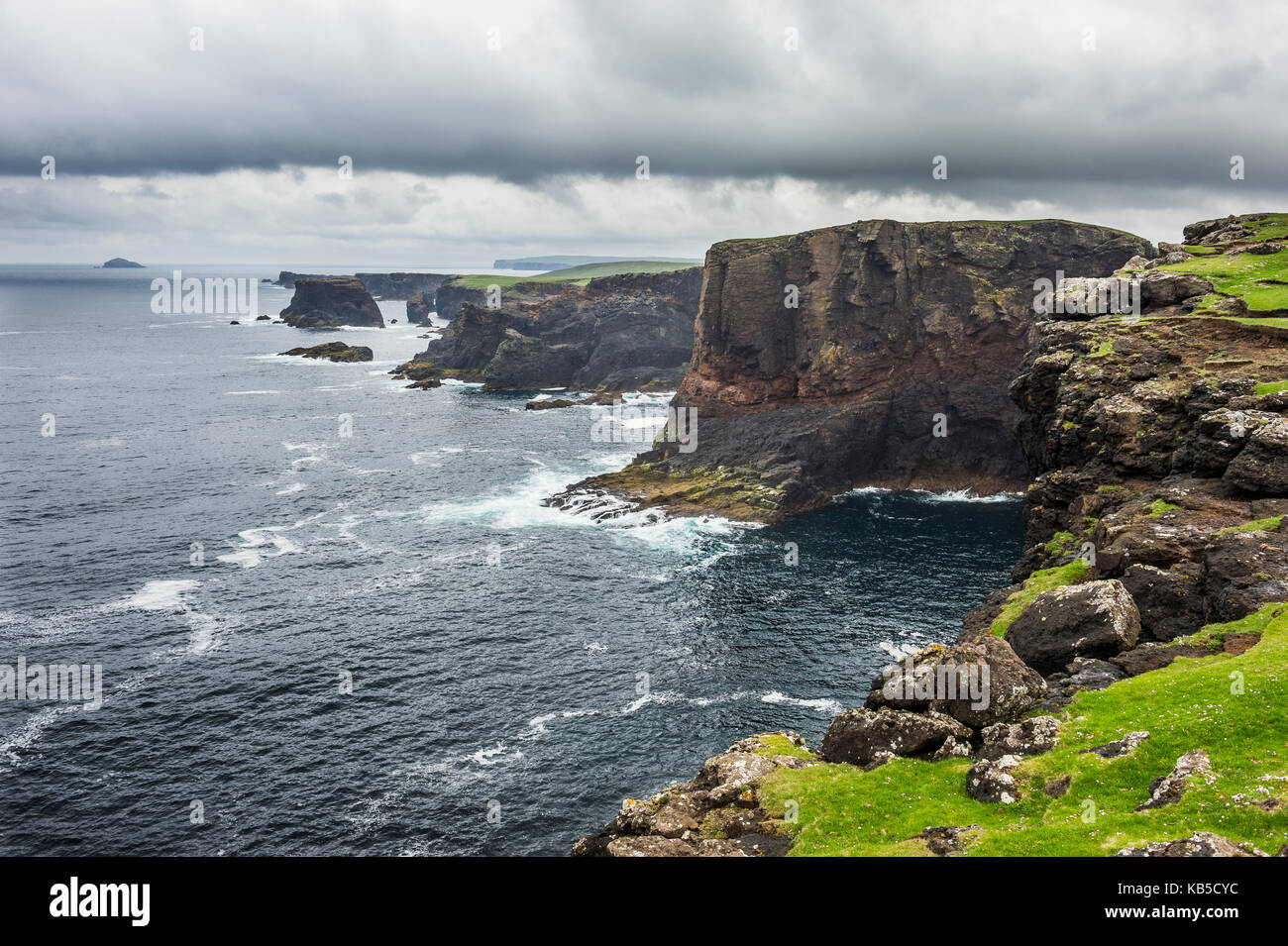 The dramatic cliffs under the Eshaness Lighthouse, Shetland Islands ...
