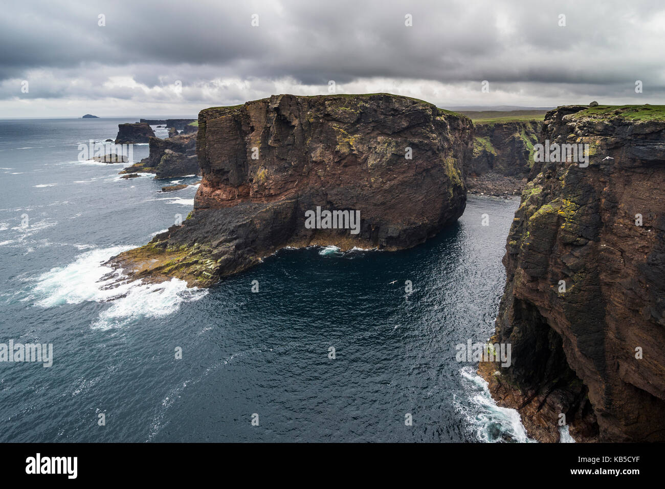 The dramatic cliffs under the Eshaness Lighthouse, Shetland Islands ...