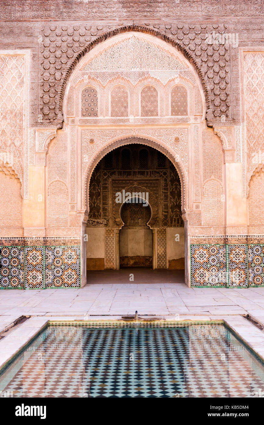 Wall of Ben Youssef Madrasa (ancient Islamic college) with reflection ...