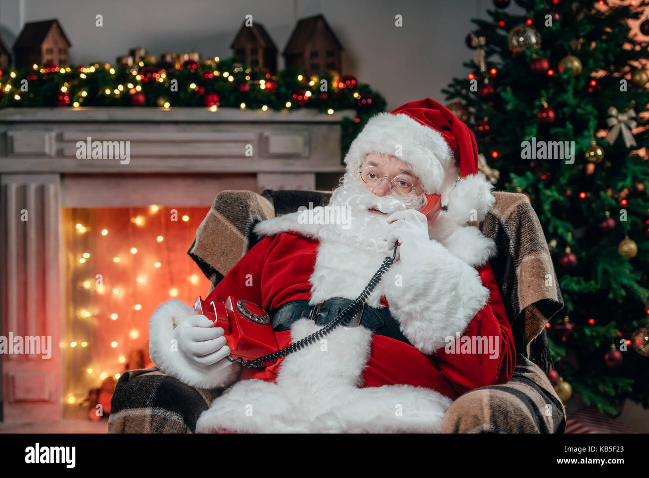 santa claus talking on phone Stock Photo - Alamy
