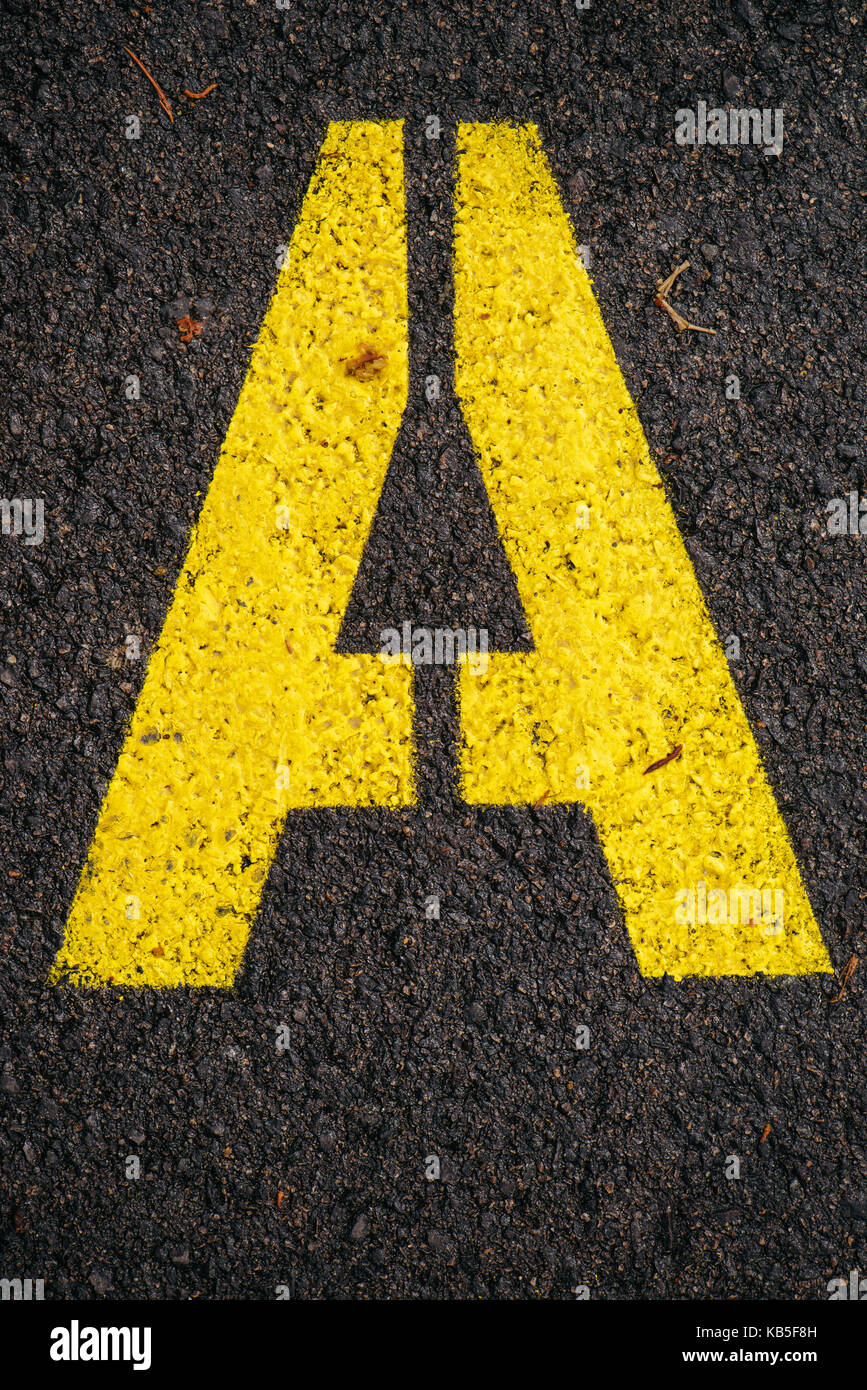 Letter A on asphalt road, top view Stock Photo - Alamy