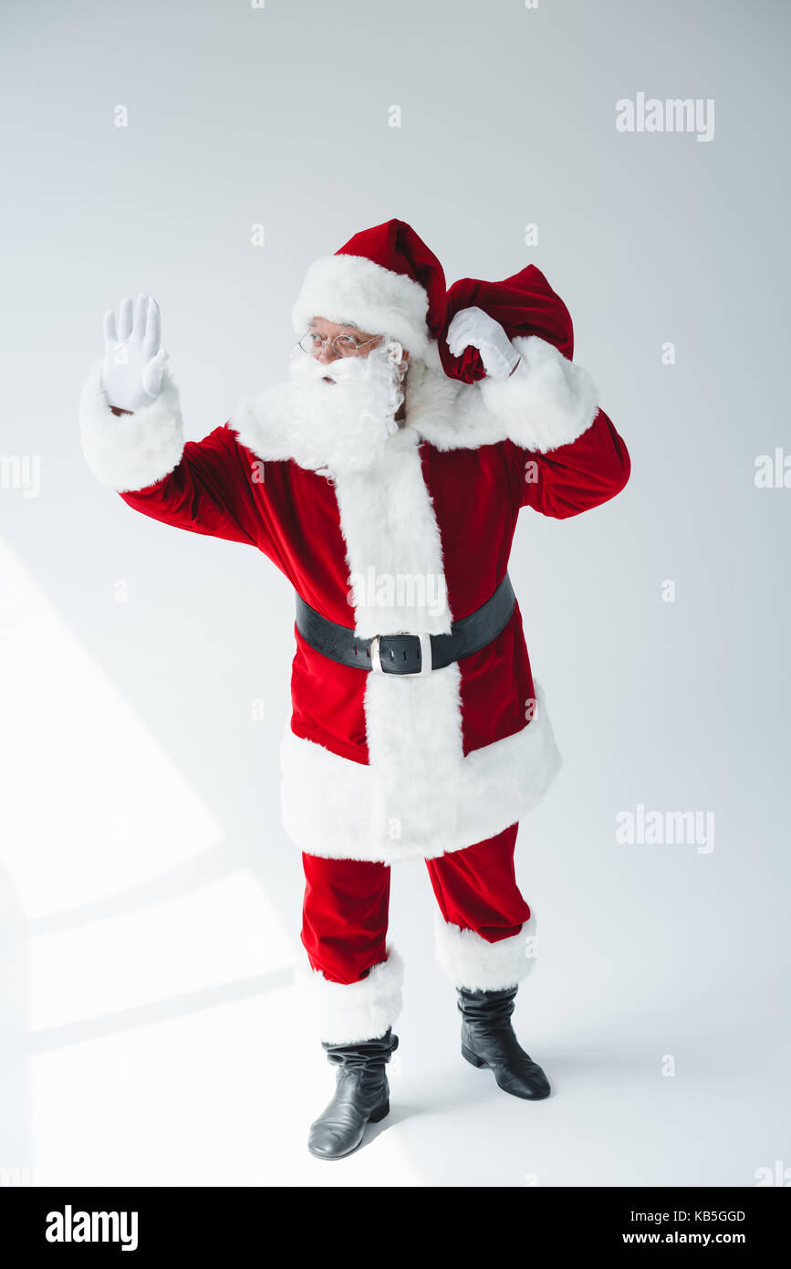 santa claus waving hand Stock Photo - Alamy