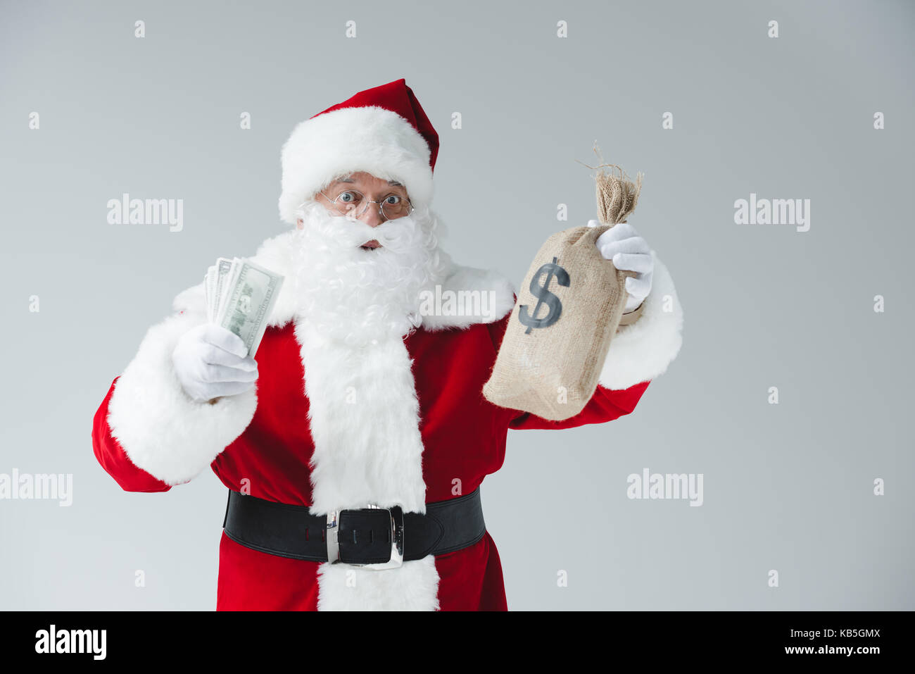 santa with dollar banknotes Stock Photo - Alamy
