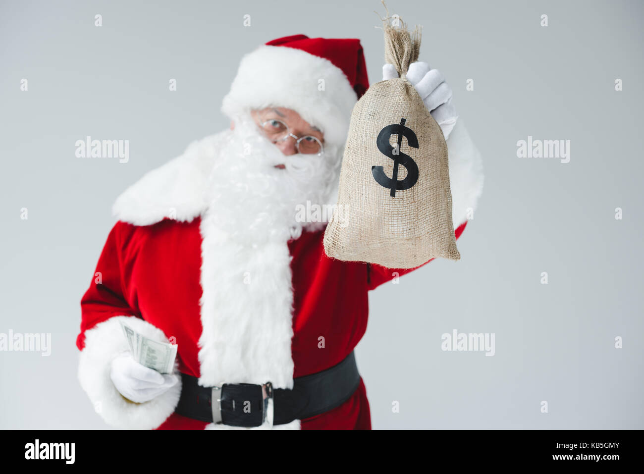 santa with dollar banknotes Stock Photo - Alamy