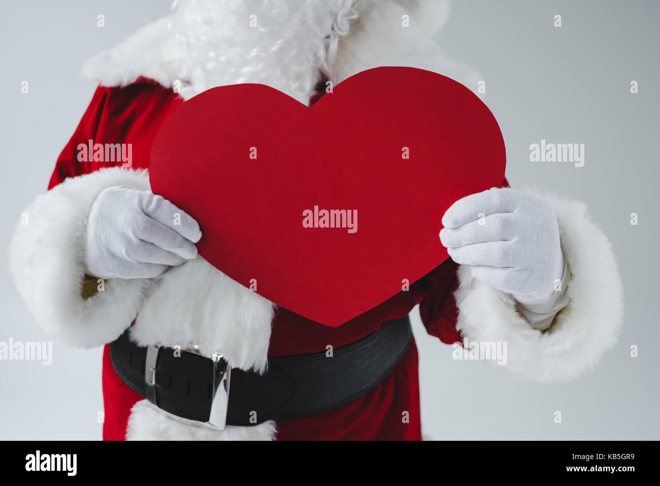 santa holding heart symbol Stock Photo - Alamy