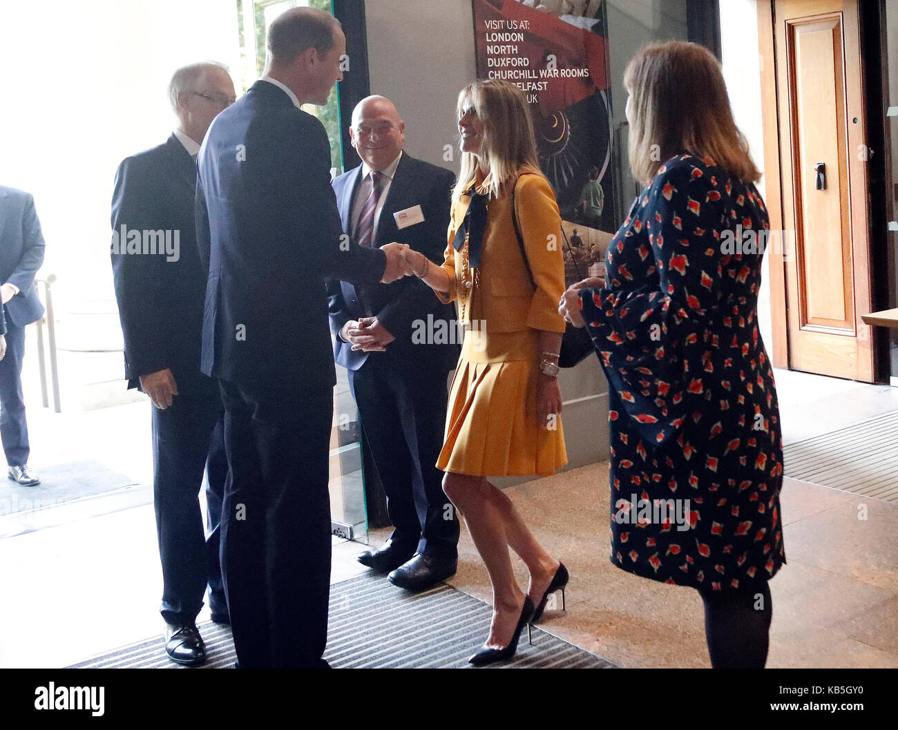 The Duke of Cambridge greets Lady Claudia Rothermere during a visit to ...