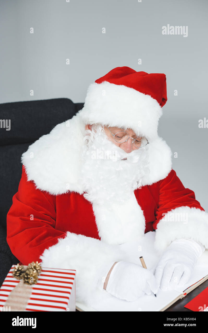 santa claus sitting in armchair Stock Photo - Alamy