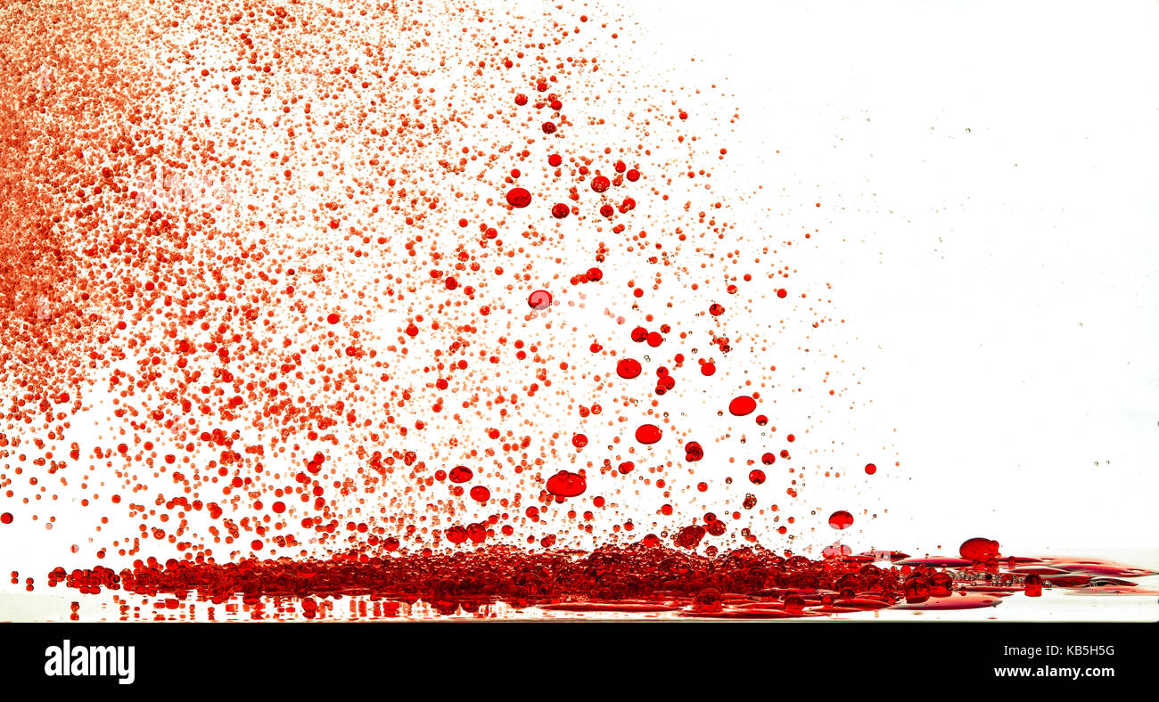 falling red bubbles on white background Stock Photo - Alamy