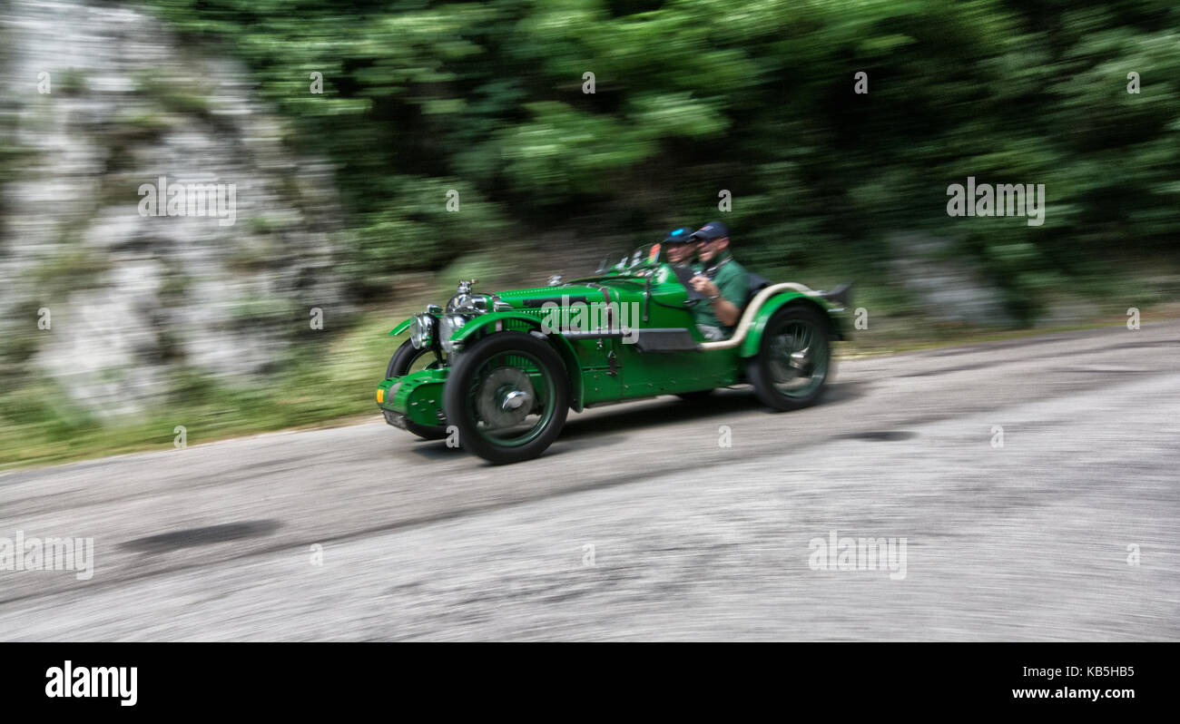 MG C TYPE MIDGET SUPERCHARGED 1932 on an old racing car in rally Mille ...