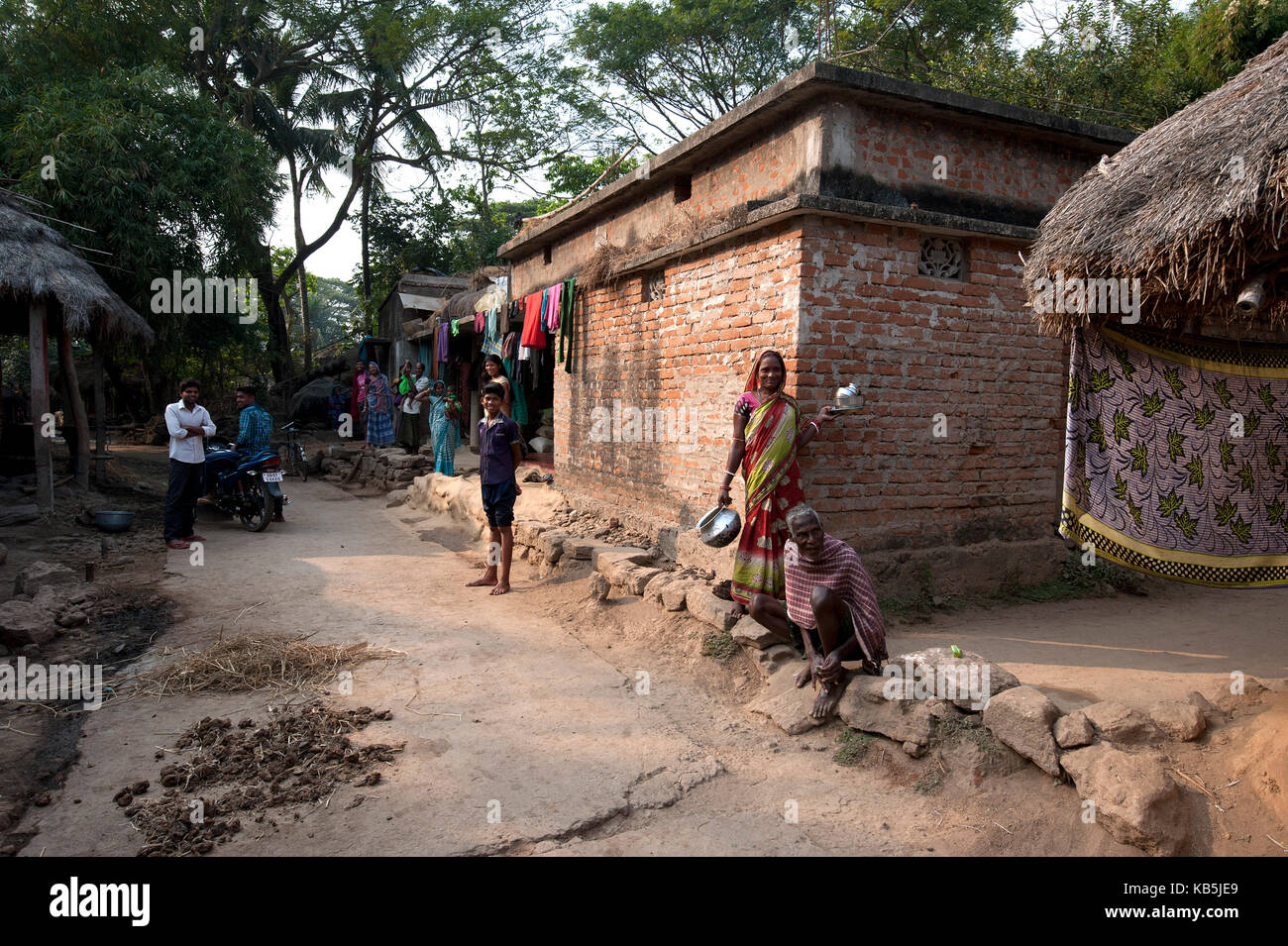 Villagers in typical rural village afternoon scene in the street ...
