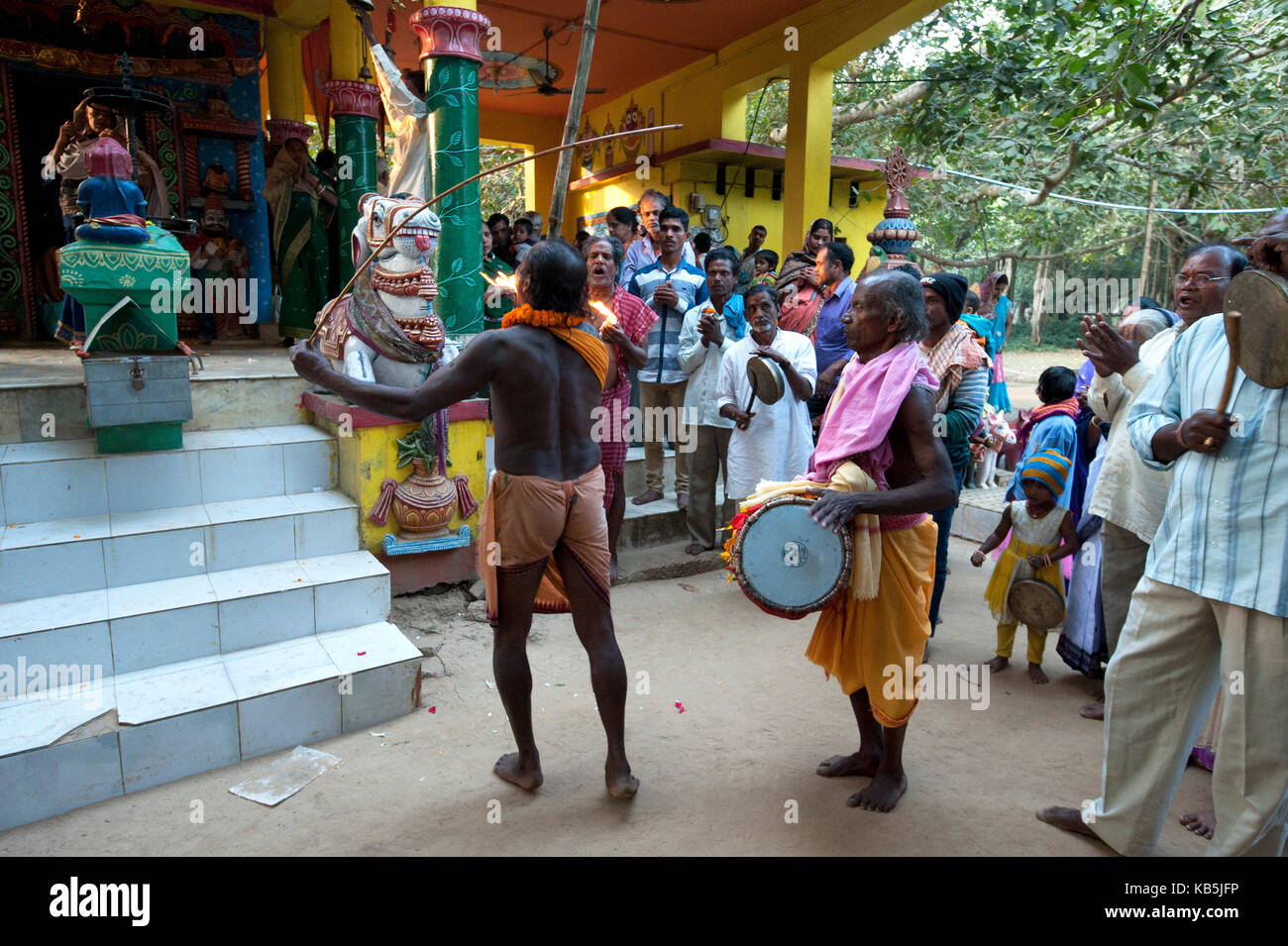 Shaman in altered state of consciousness with drummer and cymbal ...