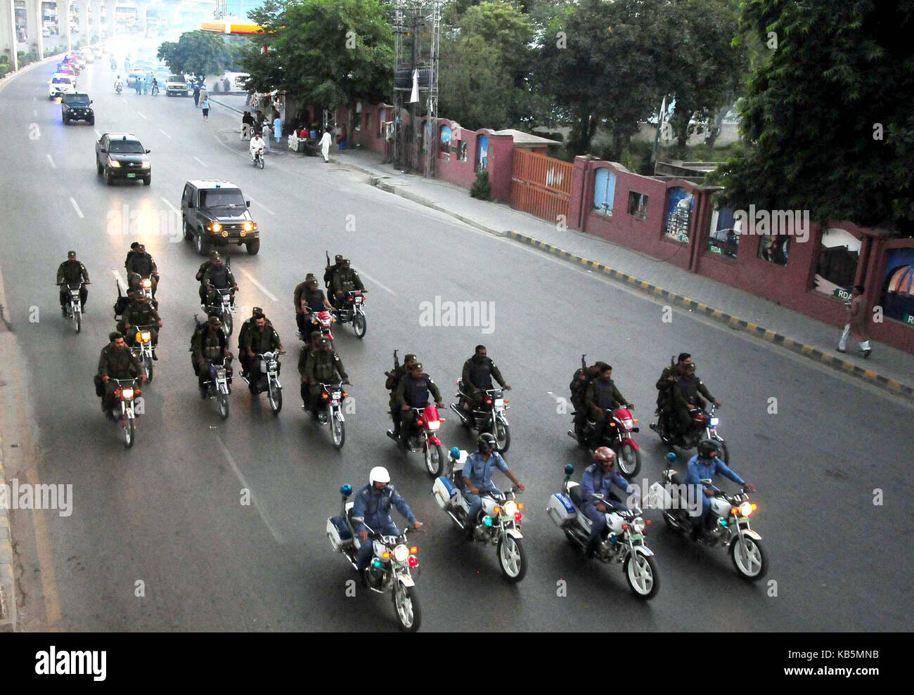 Rangers and police convoy patrols in city during flag march to maintain ...