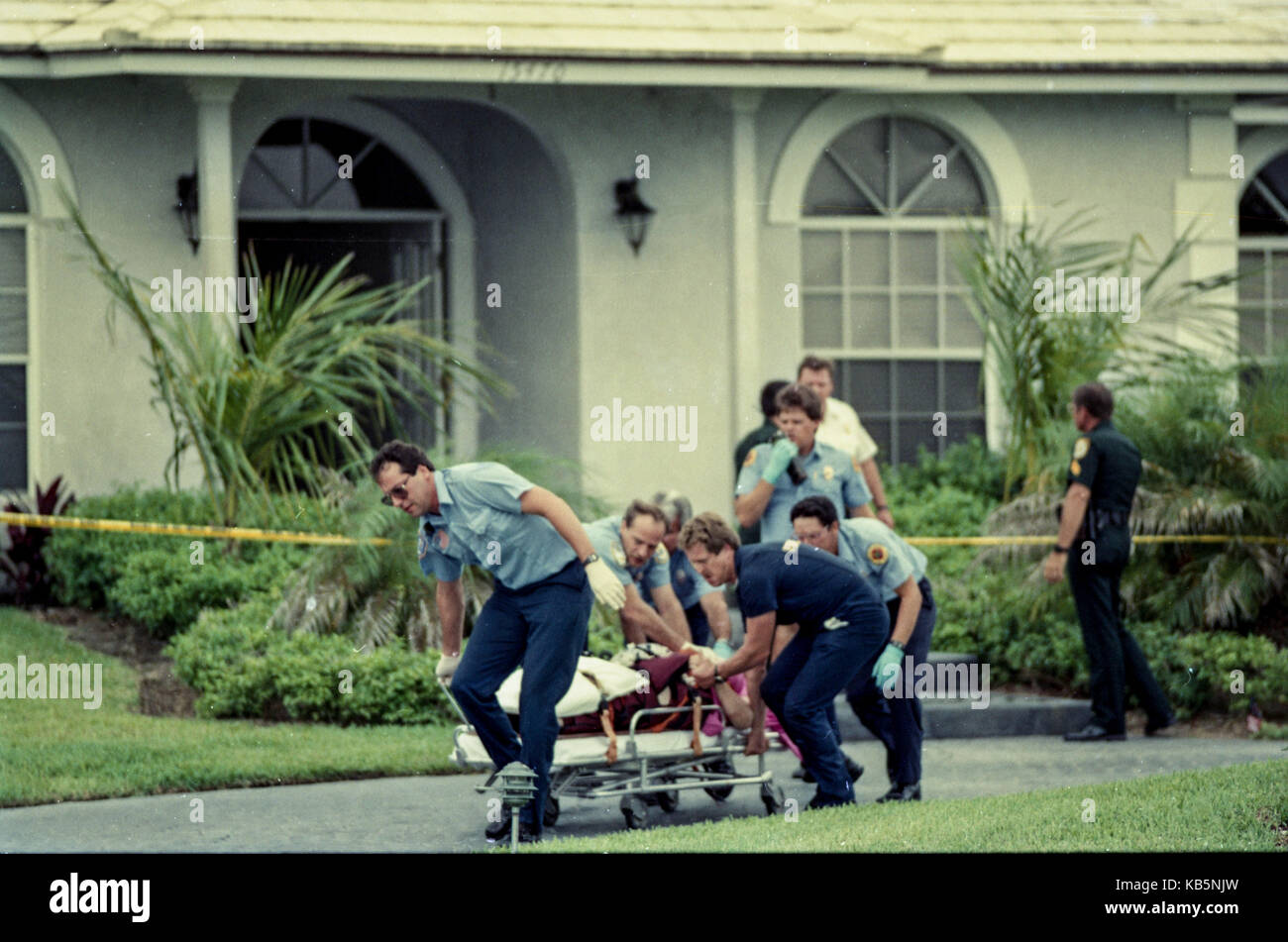Wellington, FL, USA. 26th May, 1990. Paramedics take Marlene Warren, 40 ...