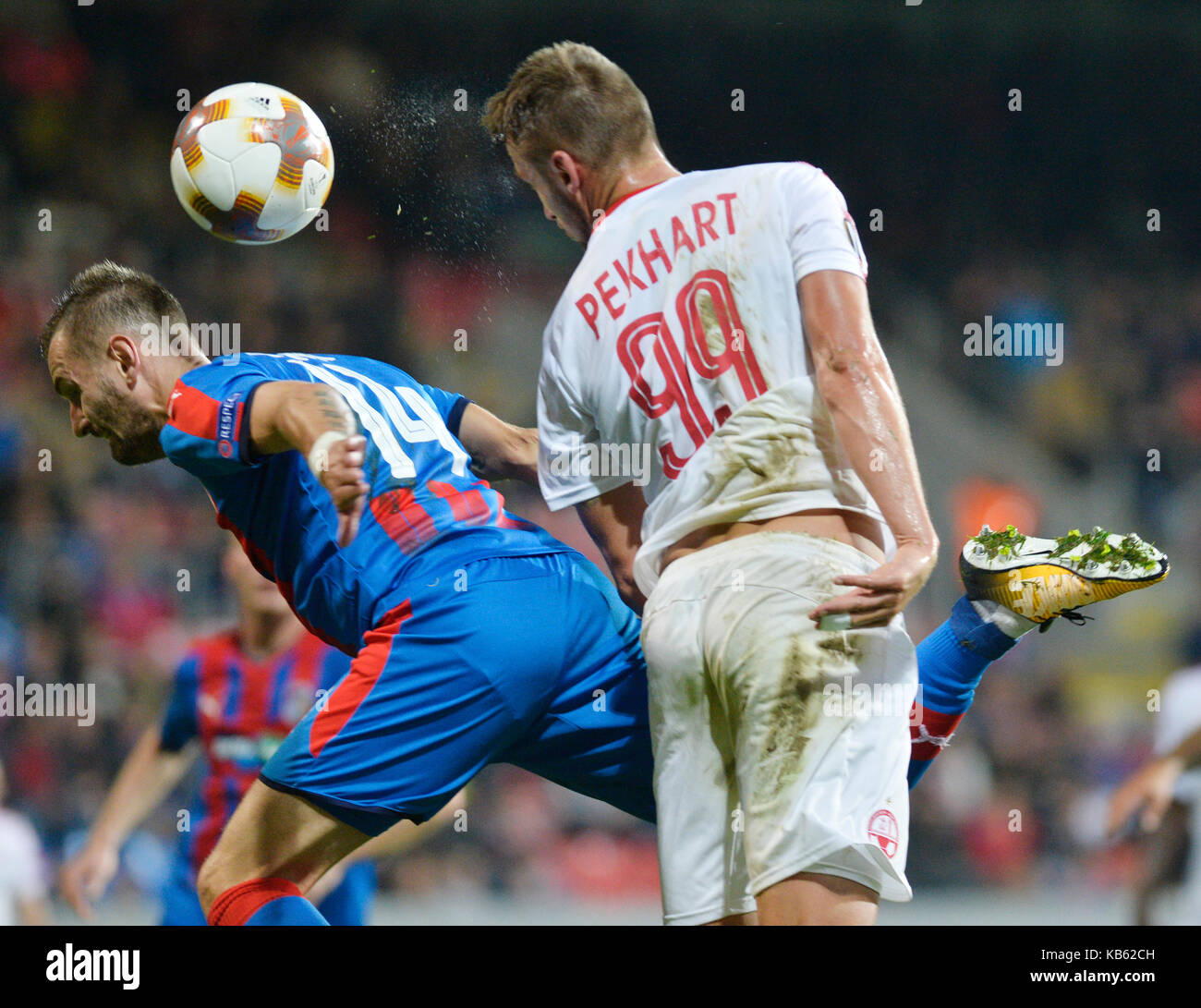 L-R RADIM REZNIK (Plzen) and TOMAS PEKHART (Beer Sheva) in action ...