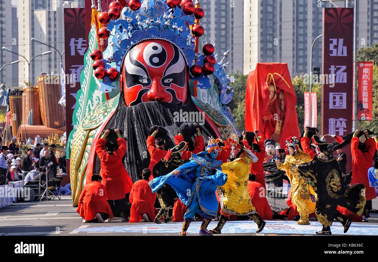 Beijing, China. 29th Sep, 2017. Opera performers display facial makeups ...