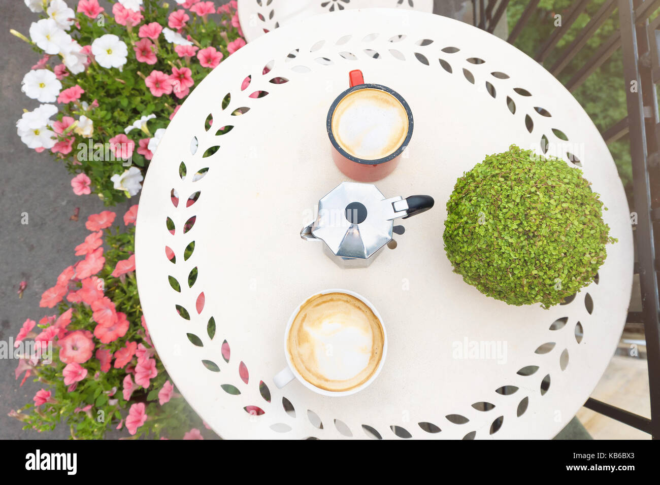 Top view of coffee table with coffee cups on balcony Stock Photo - Alamy