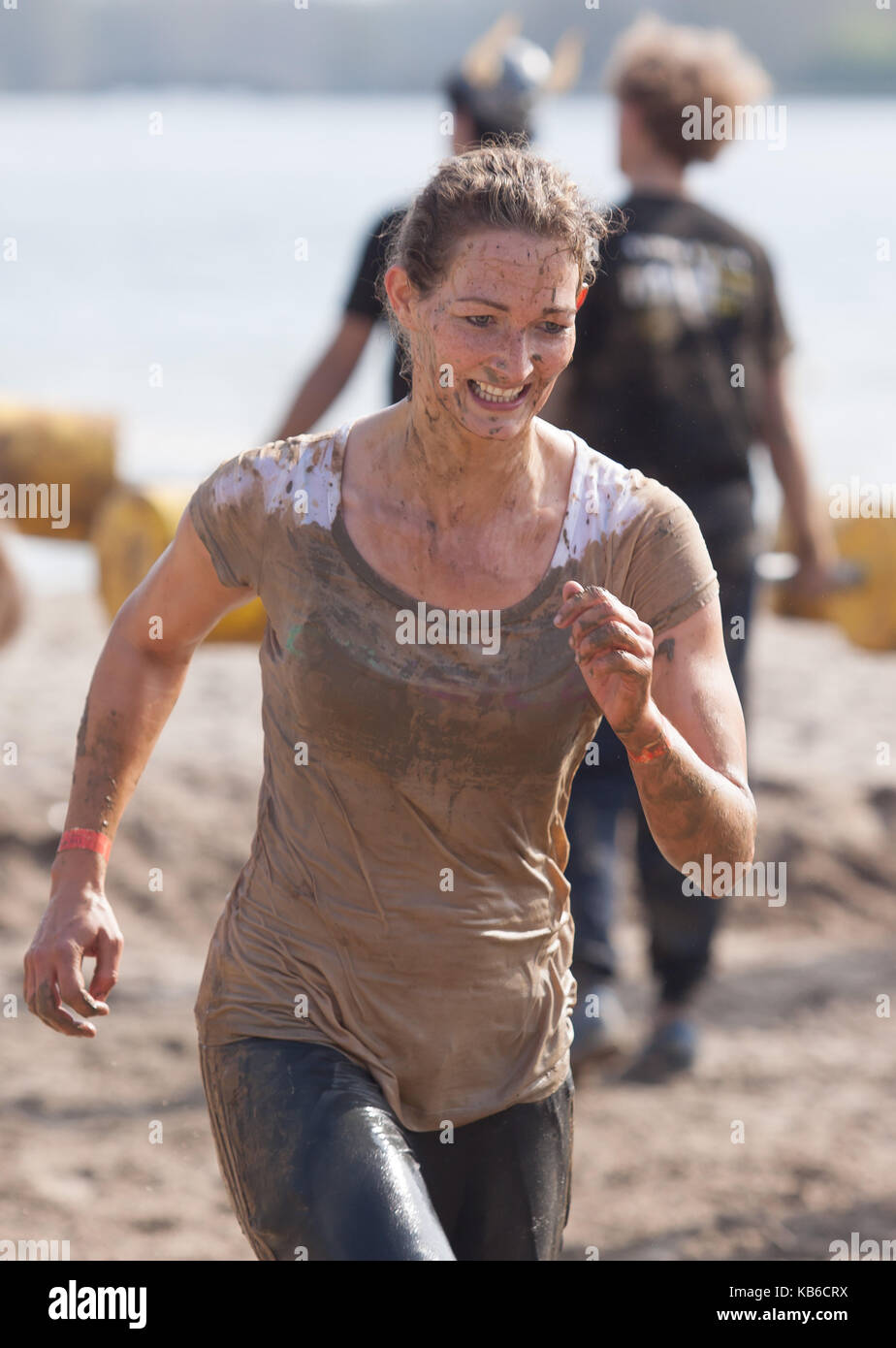Strong viking mud race Stock Photo - Alamy