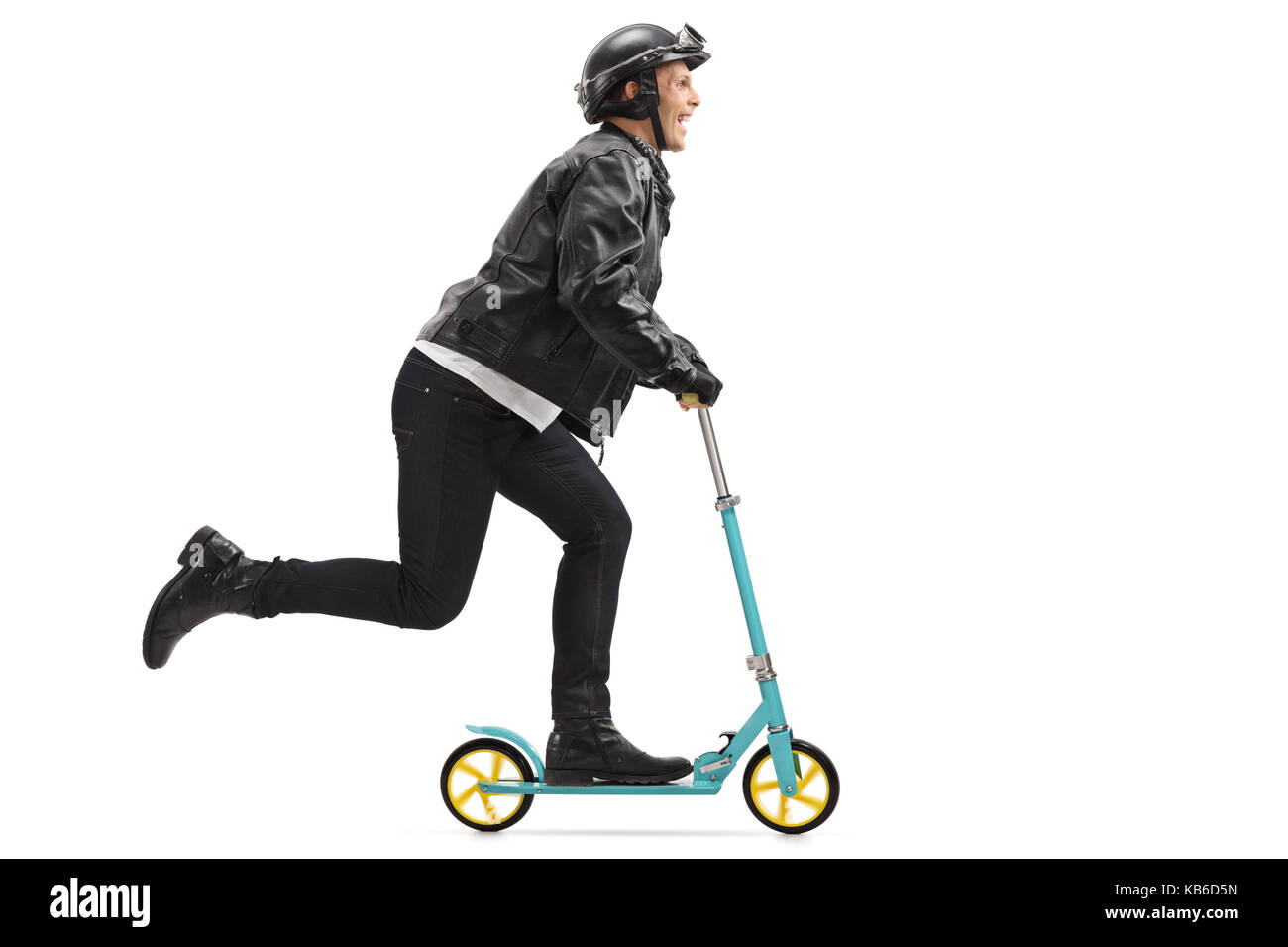 Full length profile shot of a biker riding a scooter isolated on white ...