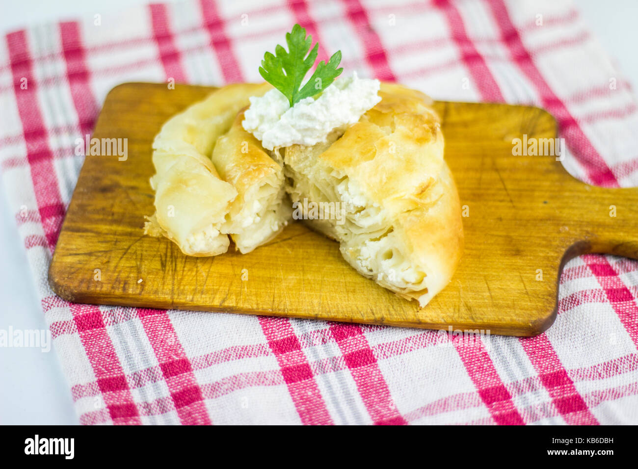 Cheese burek/sirnica composition on white background Stock Photo - Alamy