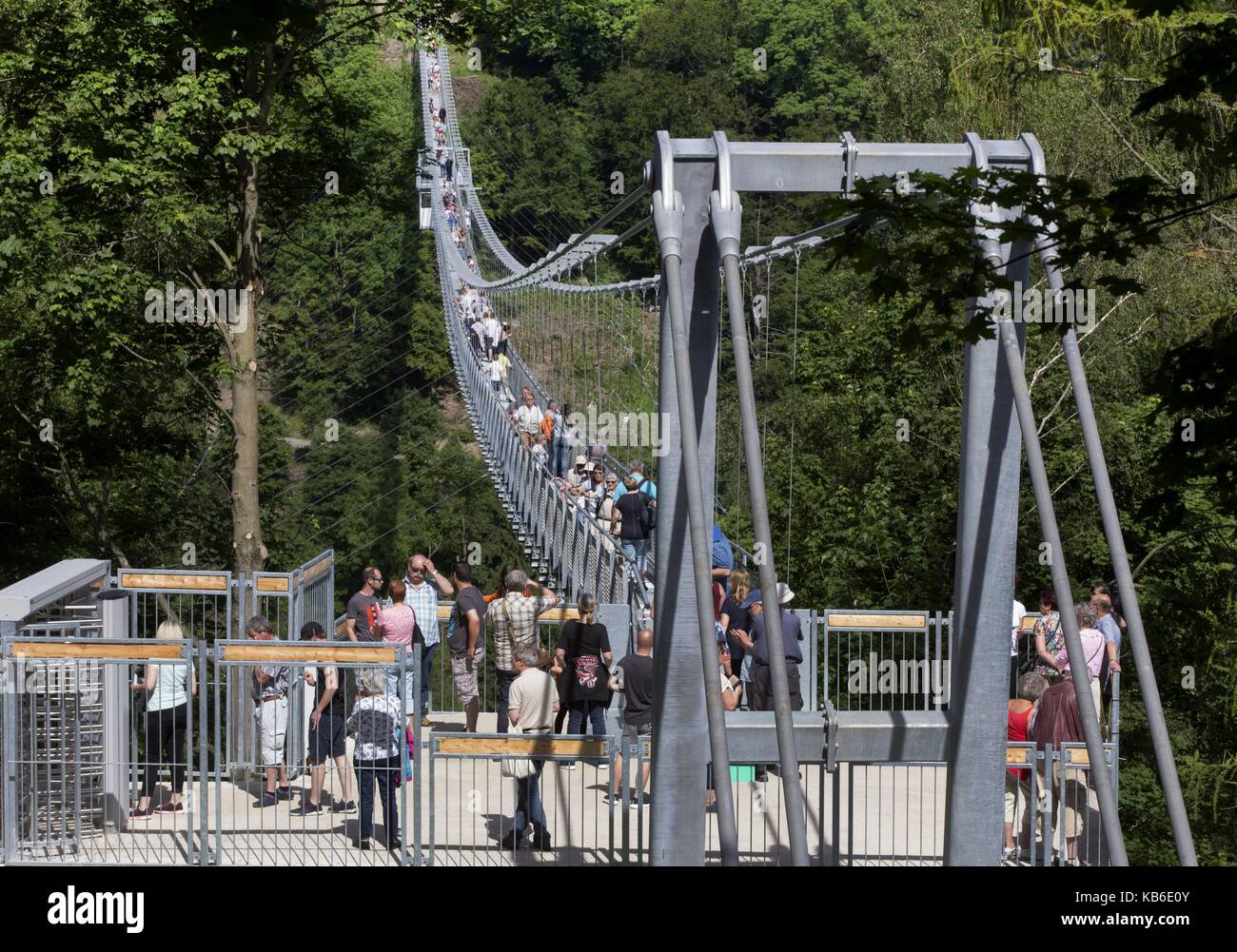 People crossing the rope bridge at Rappbodetalsperre, 11 June 2017 ...