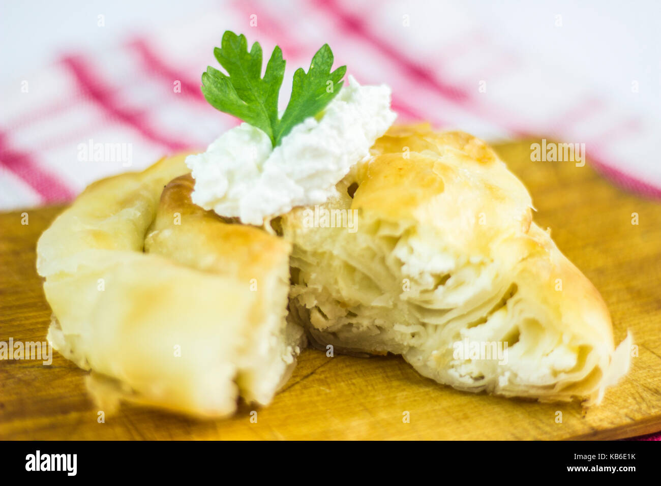 Cheese burek/sirnica composition on white background Stock Photo - Alamy