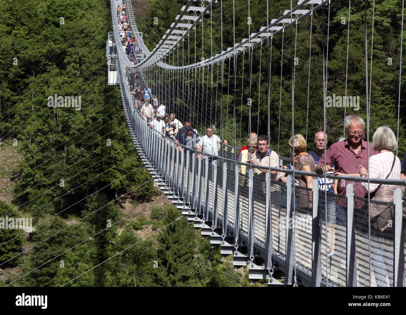People crossing the rope bridge at Rappbodetalsperre, 11 June 2017 ...