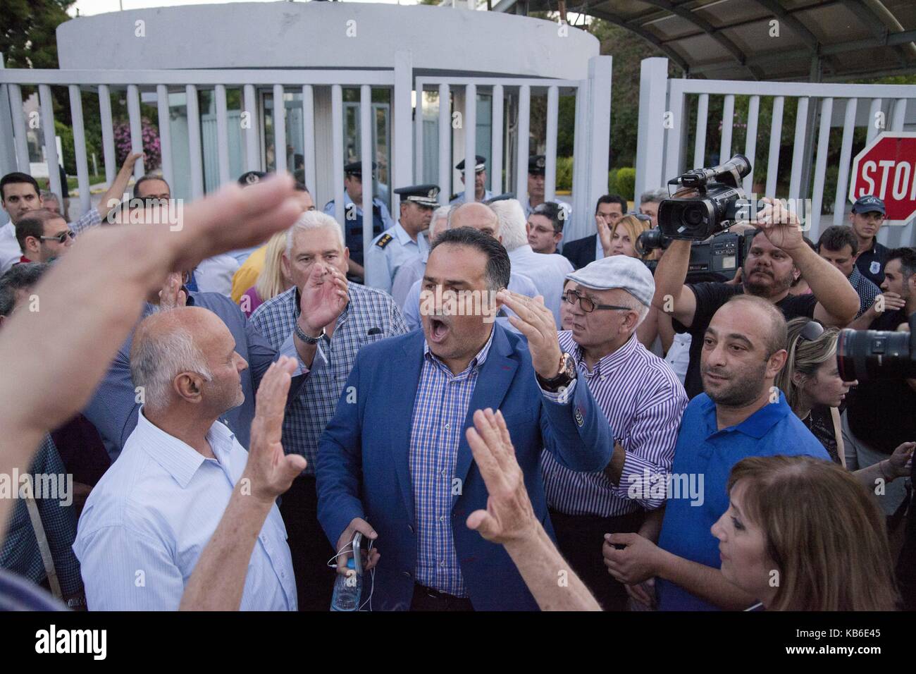 Local residents and Mayor of suburb city of Menidi, in northwestern ...