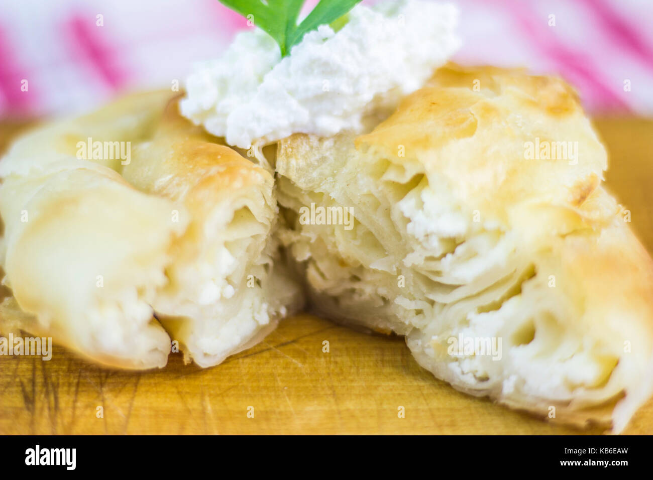 Cheese burek/sirnica composition on white background Stock Photo - Alamy