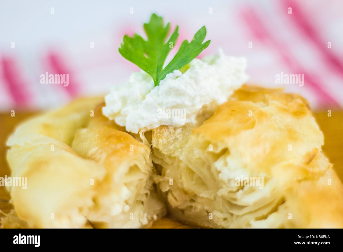 Cheese burek/sirnica composition on white background Stock Photo - Alamy