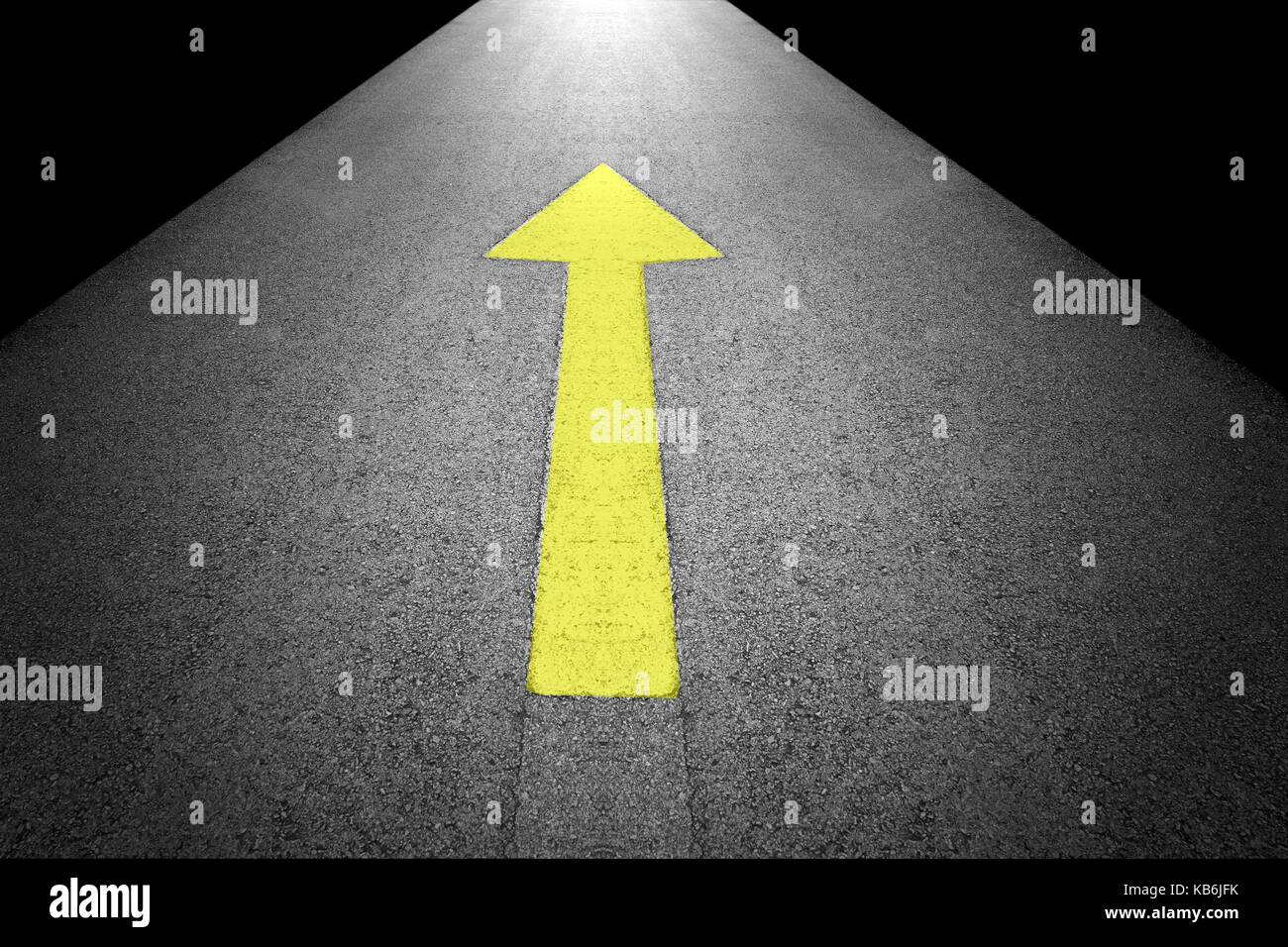 Yellow forward arrow sign on grey asphalt road Stock Photo - Alamy