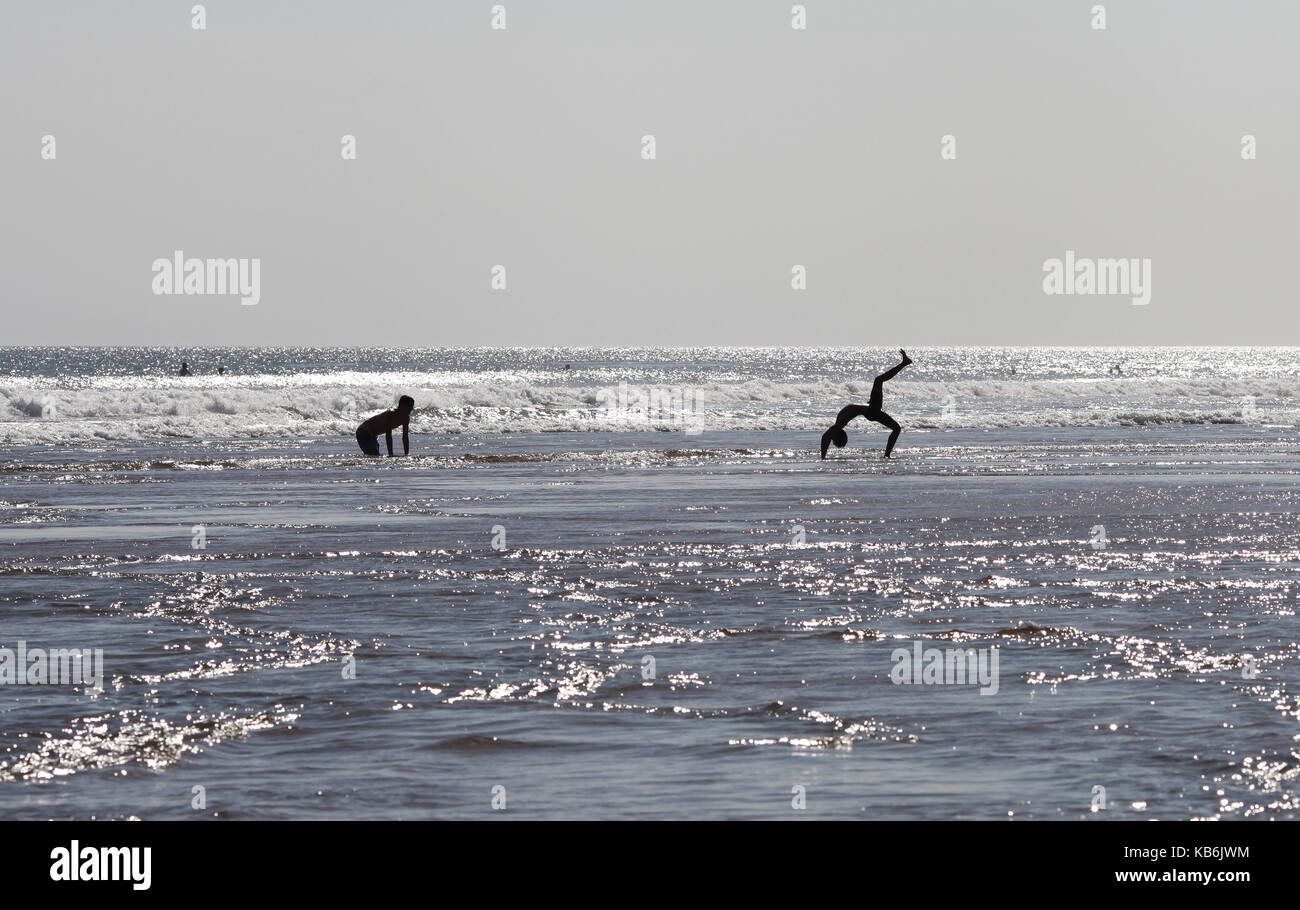 Children playing waves hi-res stock photography and images - Alamy