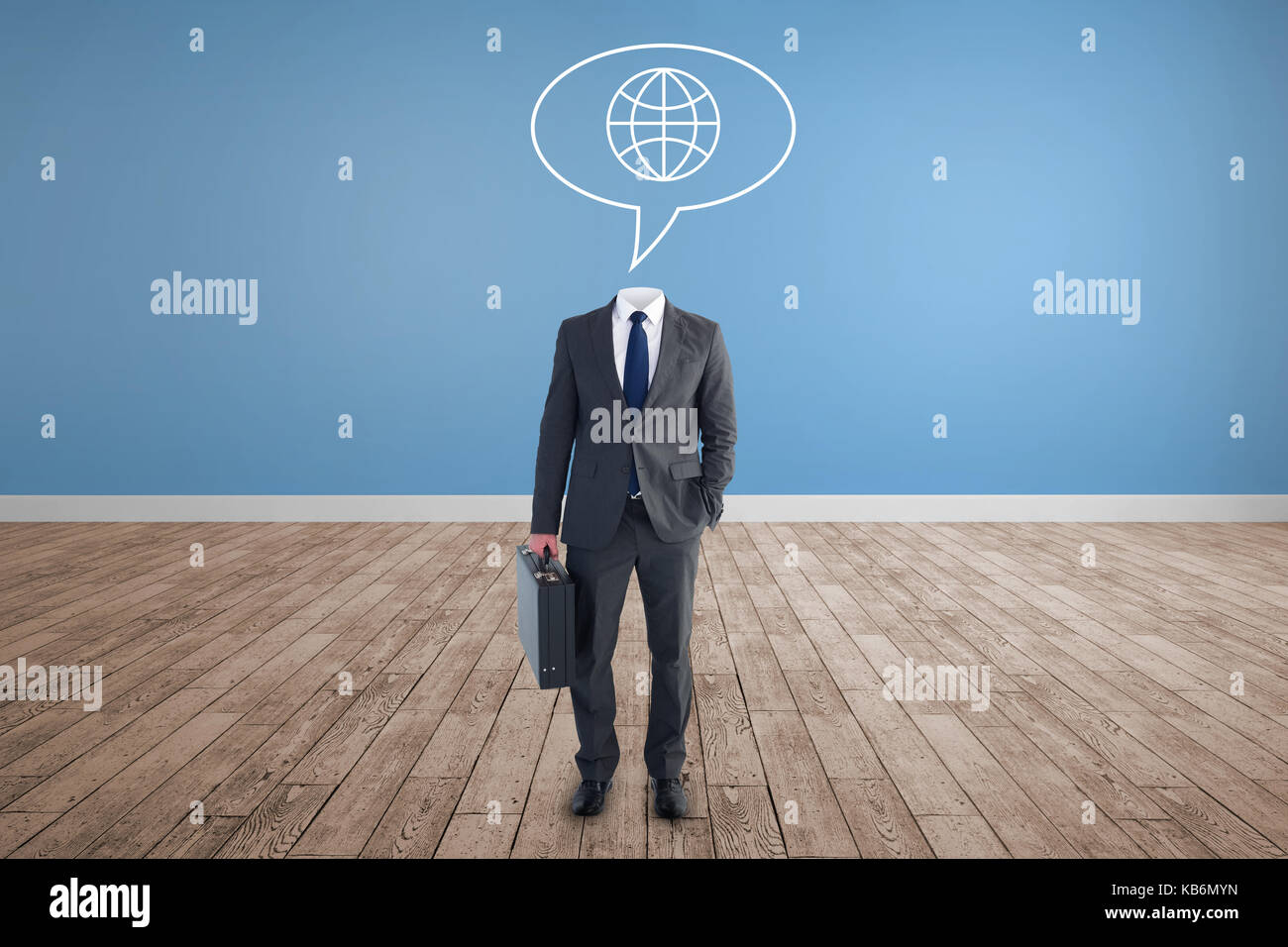 Headless businessman standing with briefcase against room with wooden ...