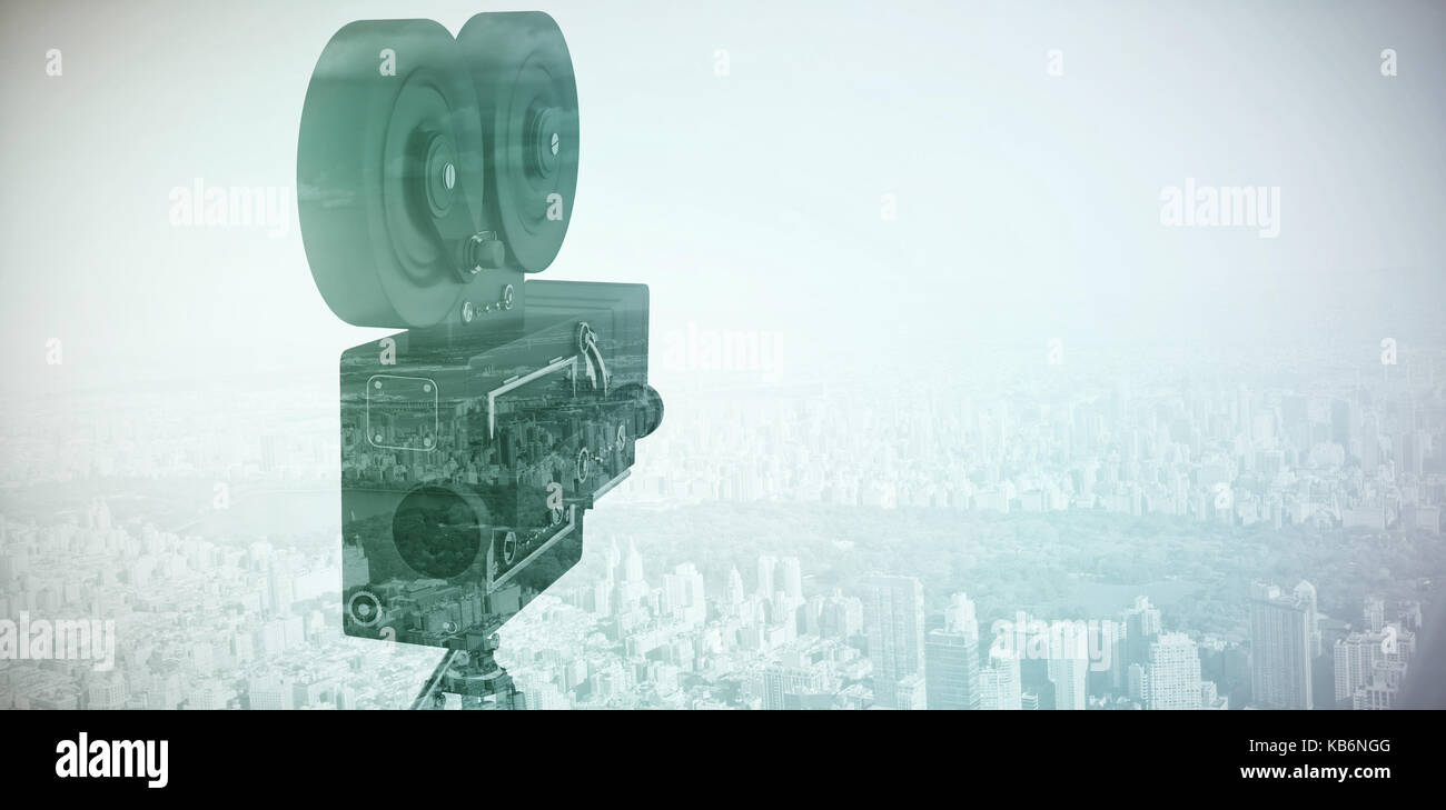 Close-up of film reel camera with tripod against aerial view of new ...