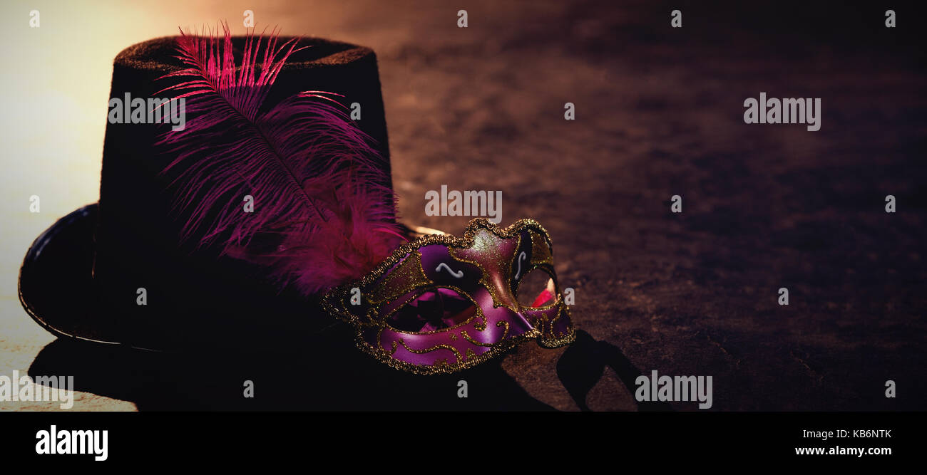 Masquerade masks and hat on stage Stock Photo - Alamy