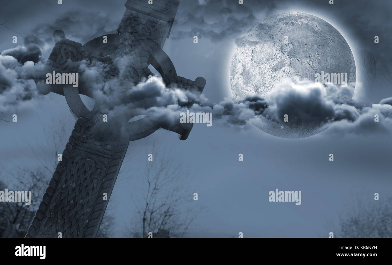 Celtic cross in front of moon behind clouds Stock Photo - Alamy