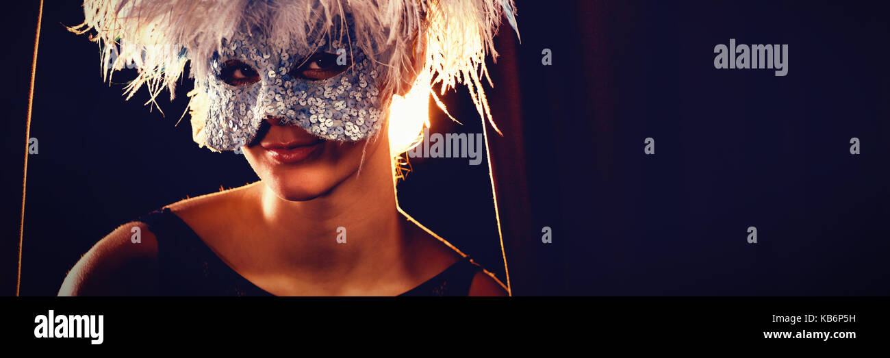 Portrait of woman in masquerade mask and wig at stage Stock Photo - Alamy