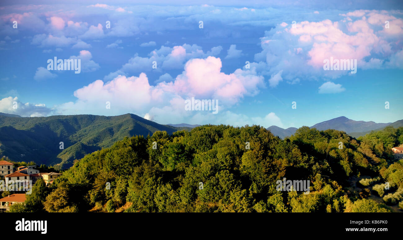 Big white cloud in the sky overhead grass mountain Stock Photo - Alamy