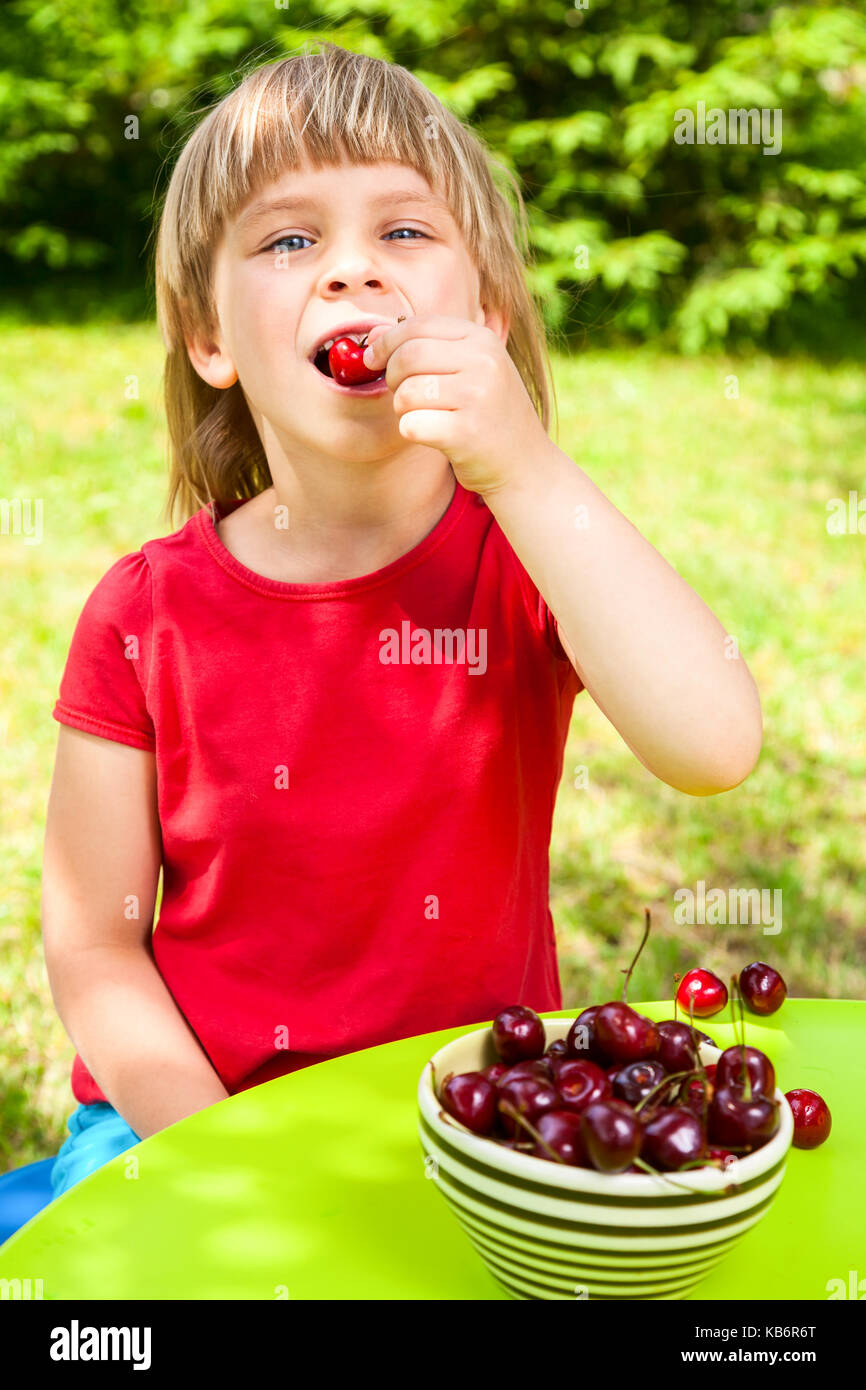 Eating cherry hi-res stock photography and images - Alamy