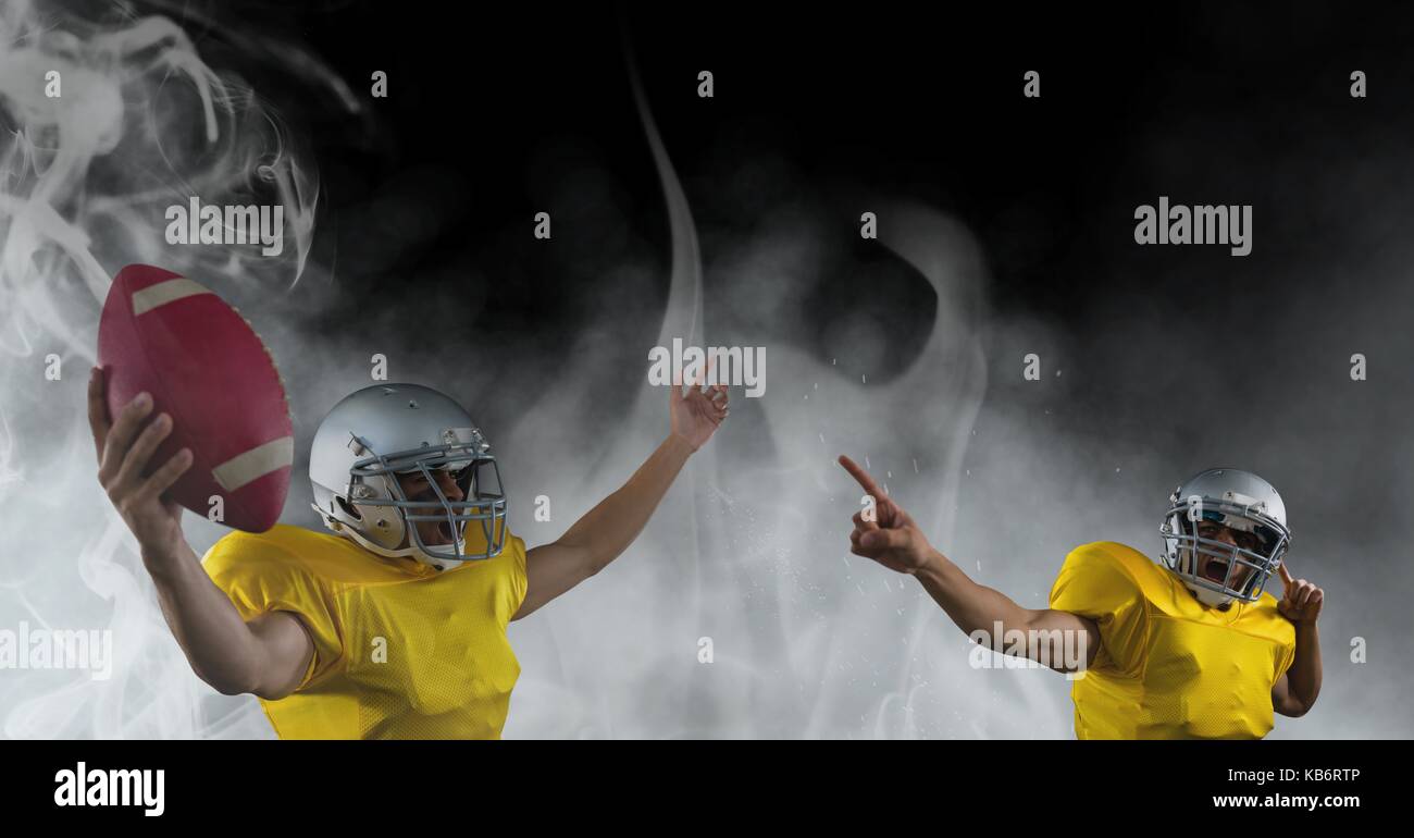 Digital composite of American football players cheering in smoke Stock ...