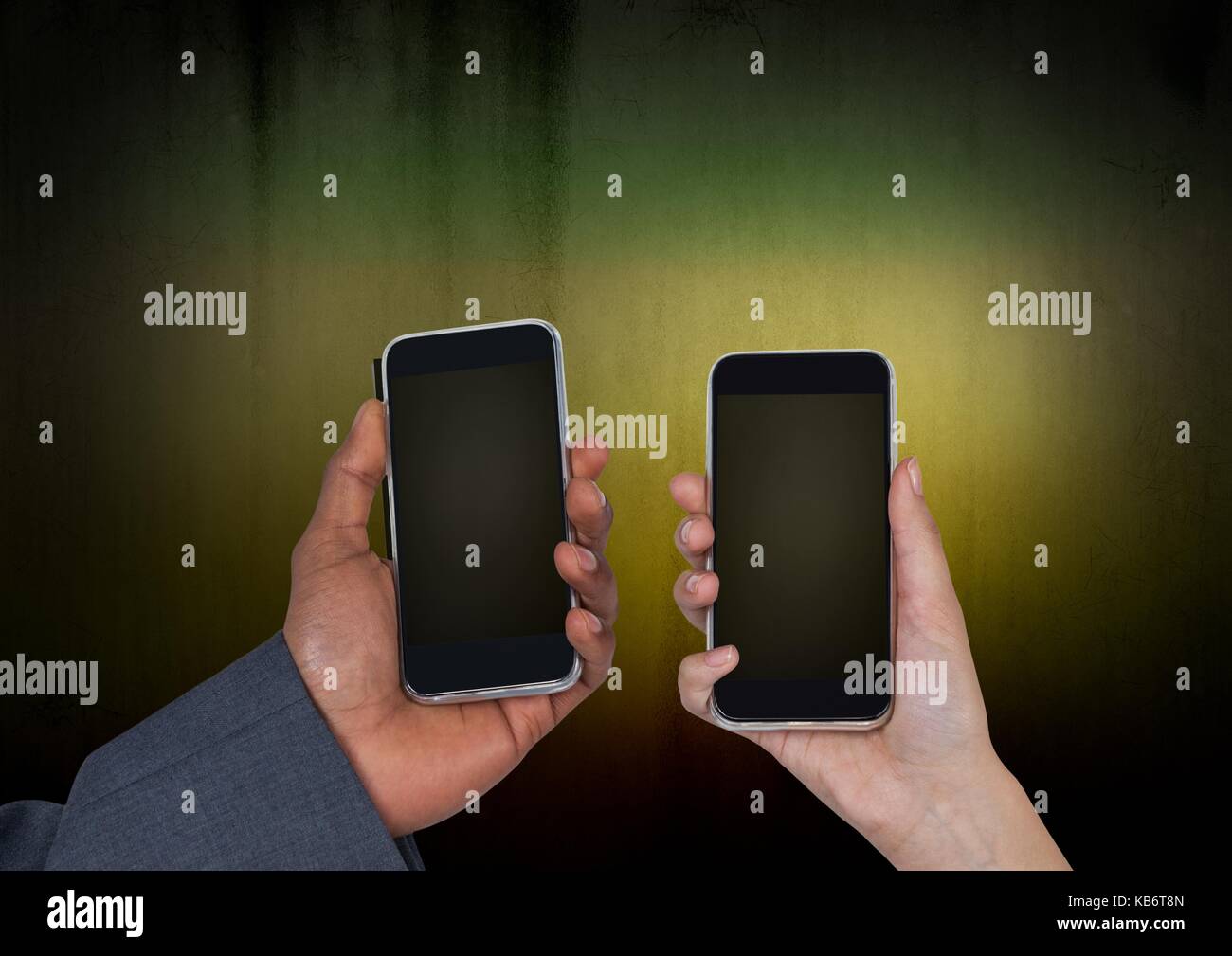 Digital composite of Two hands holding phones Stock Photo - Alamy